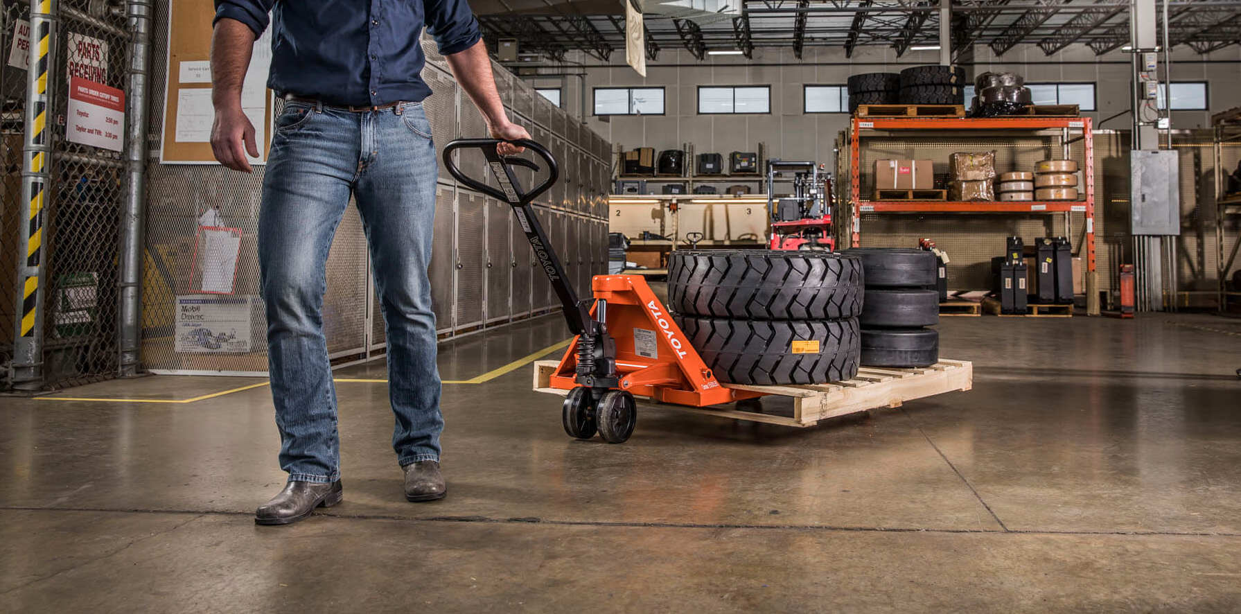 Choosing the Right Pallet Jack: New vs. Used | Coastal Material ...